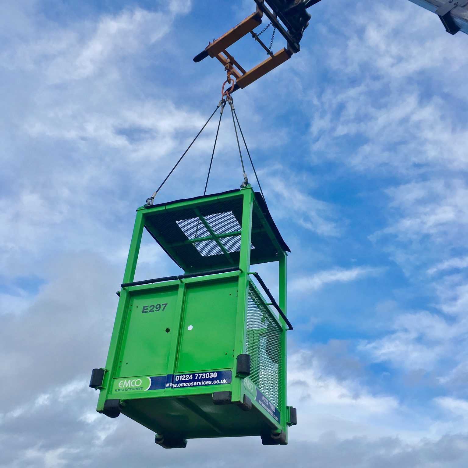 Man Riding Crane Basket - EMCO SERVICES